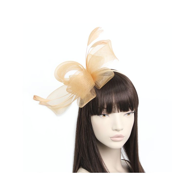 Style Jackie. Looped net fascinator on an aliceband - Inca